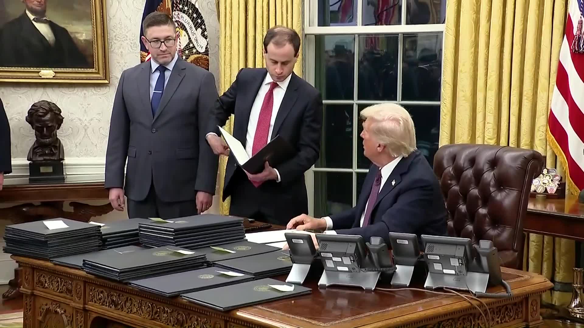 President Trump signs slew of executive orders on first night in office ...