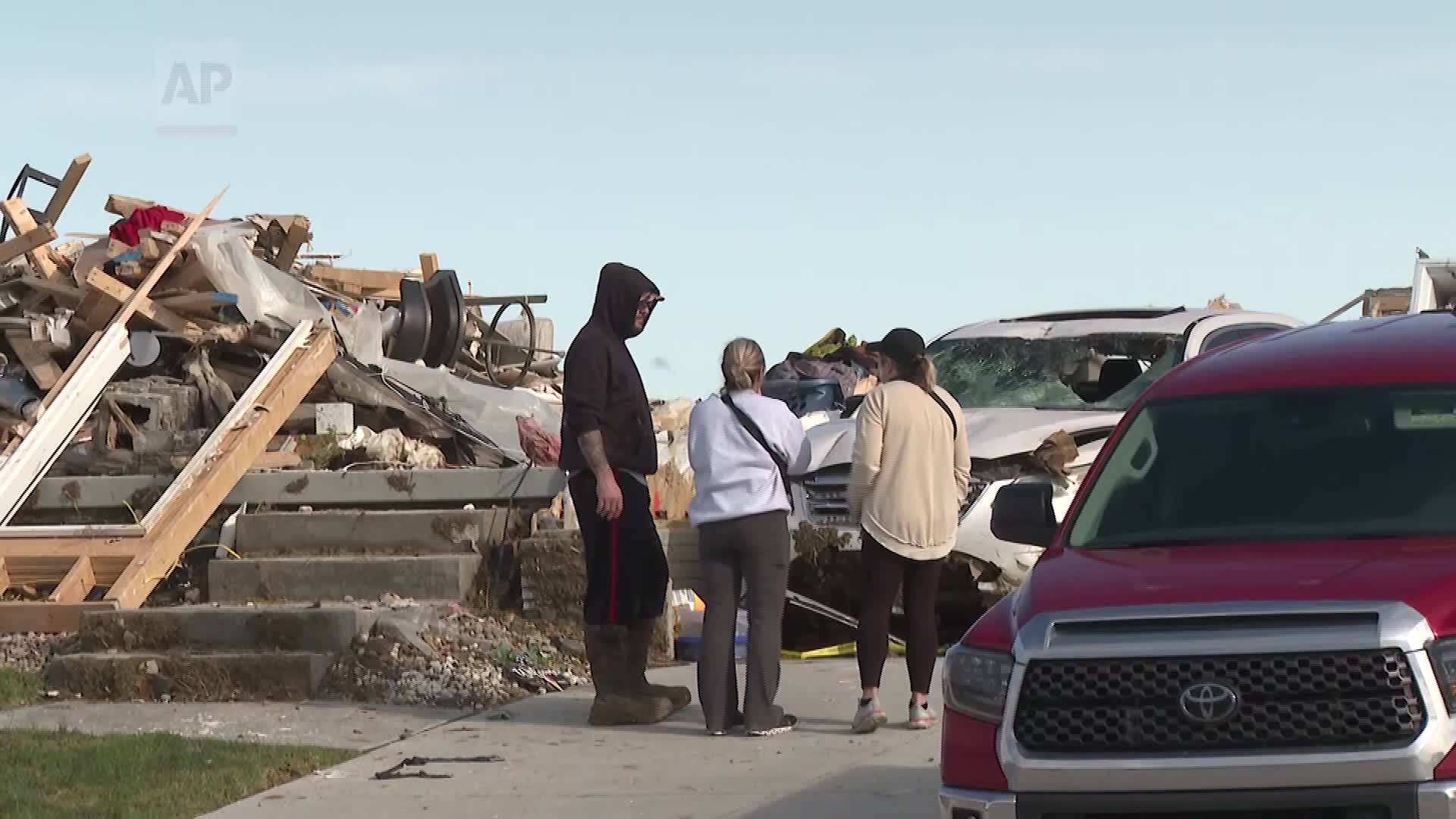 Residents begin going through the rubble after tornadoes hammer parts of Nebraska and Iowa ...