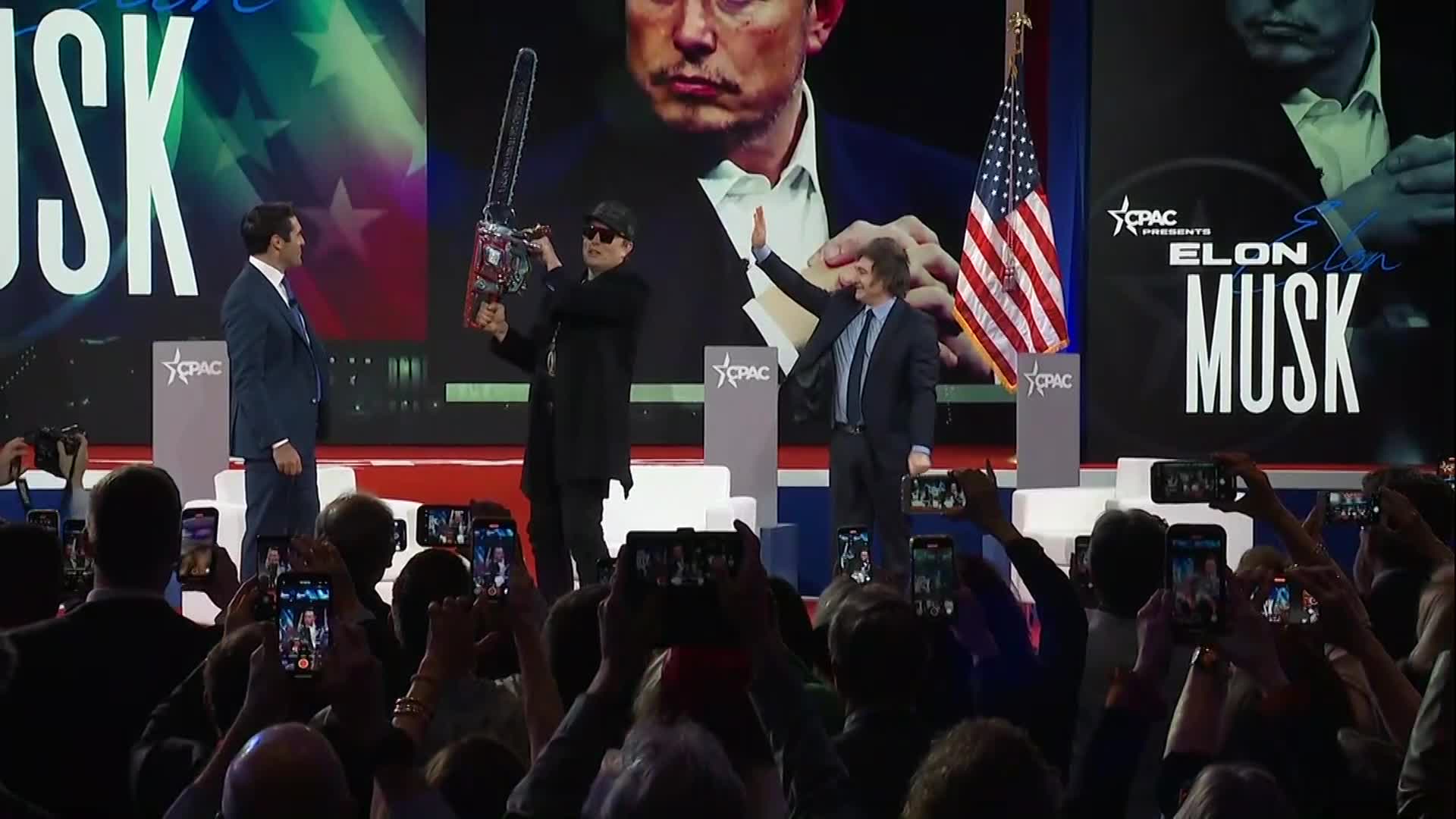 Elon Musk waves chainsaw on stage at CPAC – WSPA 7NEWS