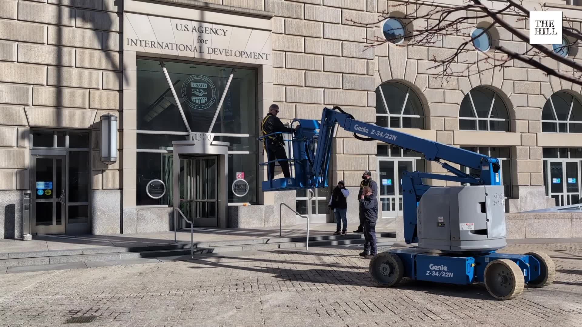 Workers dismantle USAID sign – The Hill